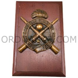 Solid Brass Ordnance Insignia Mounted on Wooden Display for Sale